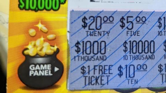 Lucky Gold Coaster turns $1 Scratchie into $10,000!
