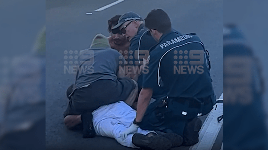 Man arrested after tinny set alight on Gold Coast canal