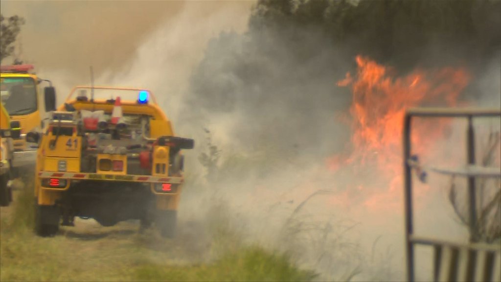 Fire crews douse massive bushfire after deadly Gold Coast plane crash